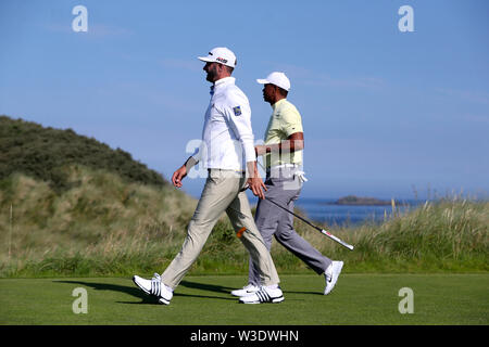 Tiger Woods, left and Dustin Johnson during the final round of the ...