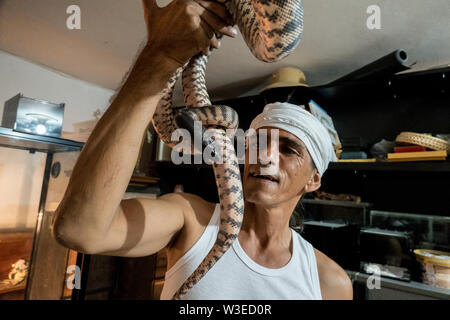 Karmei Yosef, Israel. 15th July, 2019. Israeli snake handler, breeder ...