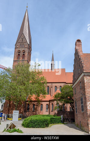 The bell tower of the cathedral in Odense, Denmark, stands as a ...