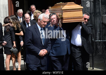The coffin of Father Ted star Brendan Grace is carried into the Church ...