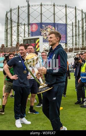England's Eoin Morgan and Joe Root celebrate at the end of the game ...