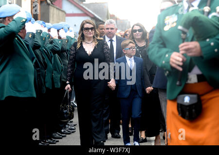Family members at the funeral of Father Ted star Brendan Grace at the ...