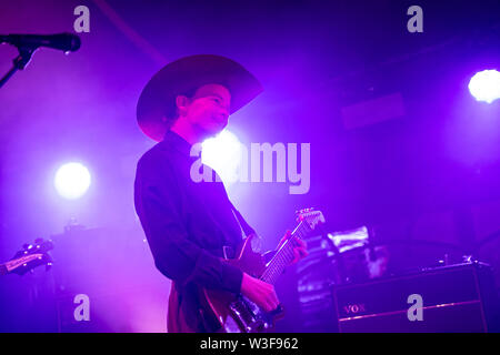 The singer and guitarist Geordie Greep of Black Midi performing at ...