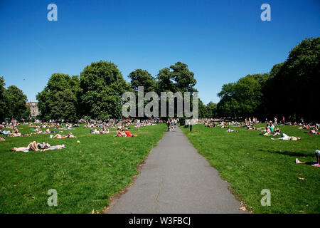 Sunbathing on Clapham Common, Clapham, London Stock Photo - Alamy