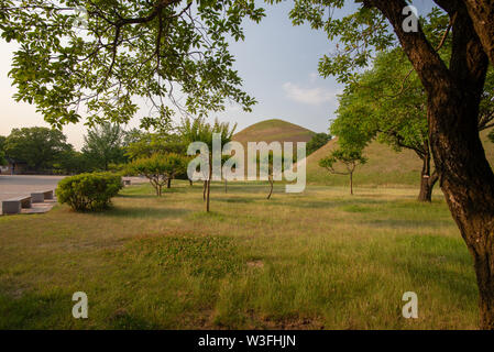 Framed view on two Daereungwon Tombs taken at sunset, Gyeongju, South ...
