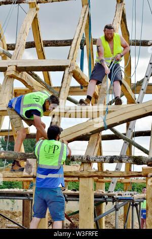 Carpenters lifting beam Stock Photo - Alamy