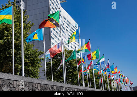 Flag parade, Rotterdam, Netherlands. National symbols waving on poles ...