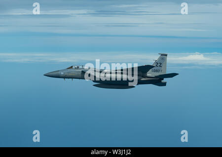 AIM-7F Sparrow air-to-air missiles attached to an F-15 Eagle alert ...