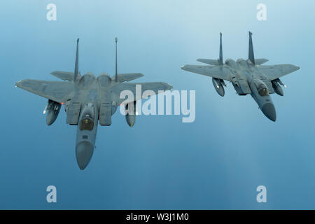 AIM-7F Sparrow air-to-air missiles attached to an F-15 Eagle alert ...