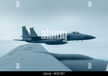 AIM-7F Sparrow air-to-air missiles attached to an F-15 Eagle alert ...