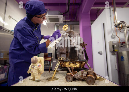 Cadbury World chocolatier Dawn Jenks adds the finishing touches to the ...