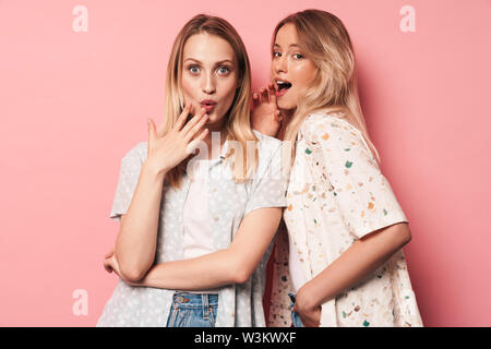 Photo of surprised shocked pretty blondes women friends posing isolated ...