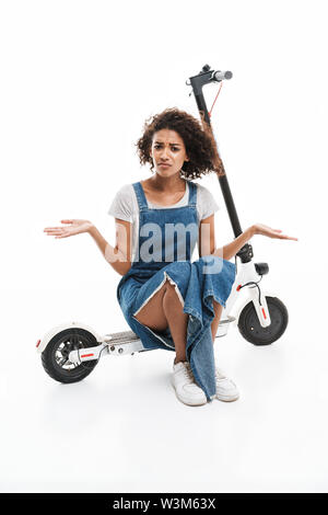 Image of attractive displeased woman with curly red hair showing finger ...