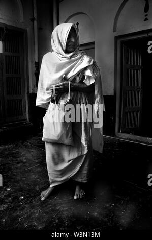 Indian Hindu widows living in communities in ashrams in Vrindavan ...