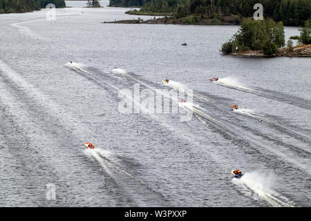Small speed boats speeding along lake Saimaa, Lappeenranta Finland ...