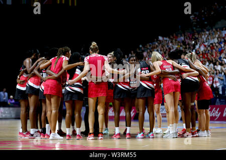 Liverpool players have a team huddle during the Premier League match at ...