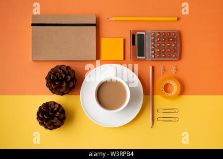 Office supplies on yellow table with copy space. Education concept ...