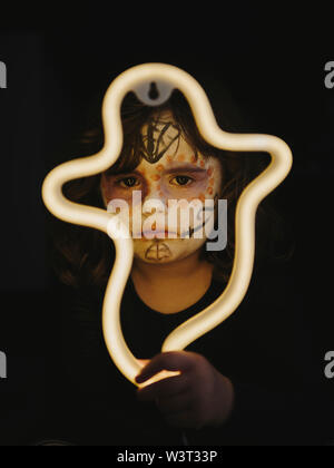 Portrait of a girl in the form of an elementary school. A first-grader ...