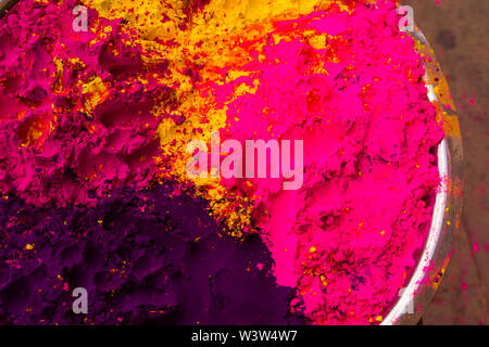 People throwing color powder and color water onto each other at Holi ...