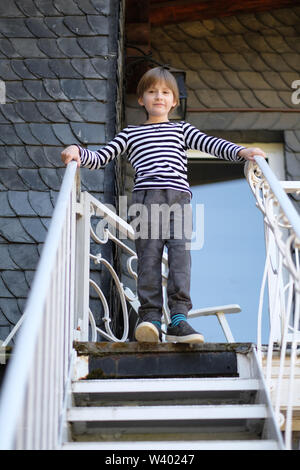 Stylish metal stands Stock Photo - Alamy