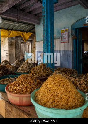 Baskets of dried fish and shrimp for sale on the street in the ancient ...
