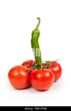 Tomatoes on the vine and Fefferoni, green Meditteranean semi-hot pepper ...