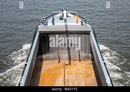 Empty inland vessel / canal barge on the river Meuse at Namur, Belgium ...