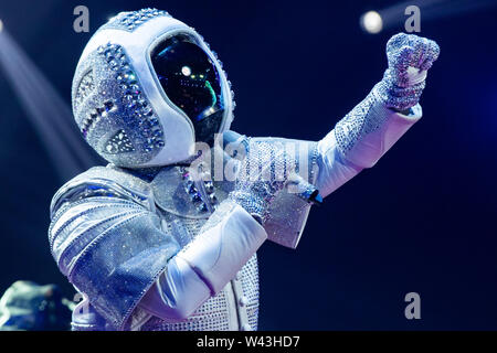 Cologne, Germany. 18th July, 2019. The character "Astronaut" performs ...