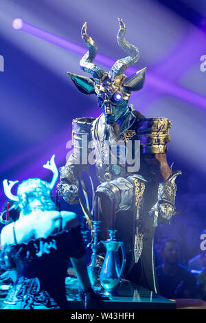 Cologne, Germany. 18th July, 2019. The character "Astronaut" performs ...
