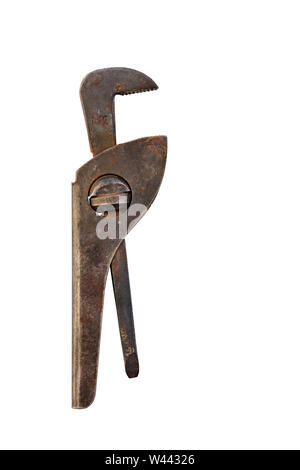 A very old, rusty pipe wrench is located horizontally and is isolated ...