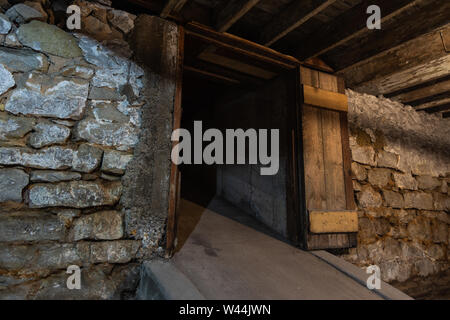 Old concrete loading chute in warehouse basement Stock Photo - Alamy