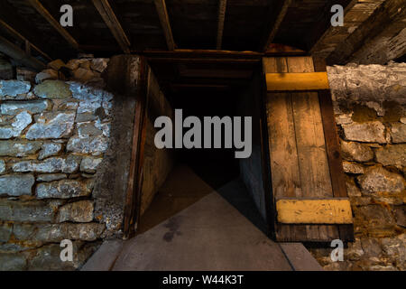 Old concrete loading chute in warehouse basement Stock Photo - Alamy