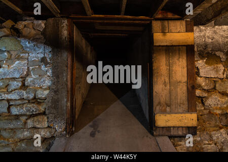Old concrete loading chute in warehouse basement Stock Photo - Alamy
