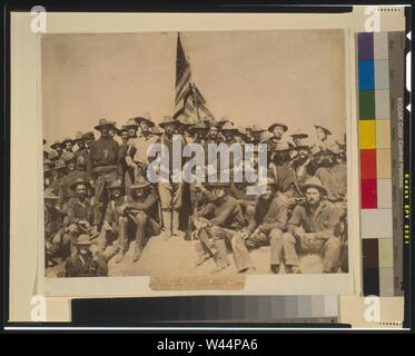 Colonel Roosevelt and his Rough Riders at the top of the hill which ...