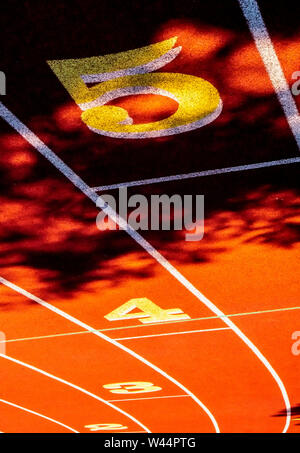 Track and field lanes and numbers. Running lanes at a track and field ...