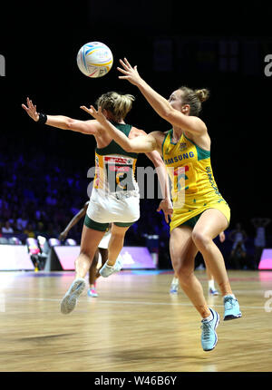South Africa's Erin Burger right, tries to pass over the defense of ...