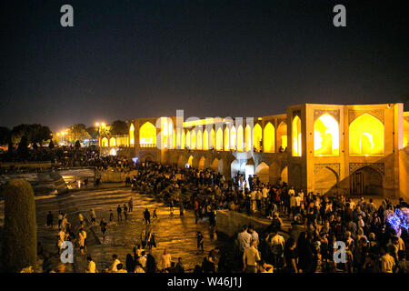 ISFAHAN, IRAN - JULY 9, 2019: People enjoying evening at Khaju bridge ...