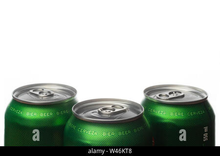 Three green cans of beer. Background for a pub. Beer store. Relax at ...