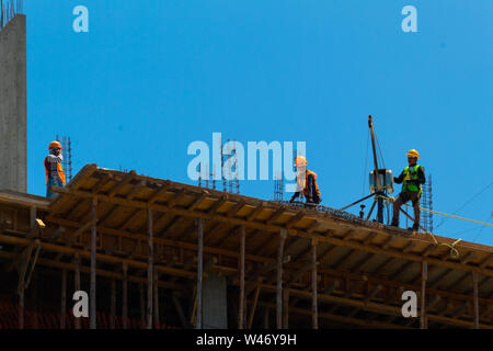 Mexican construction workers performing various tasks Stock Photo - Alamy