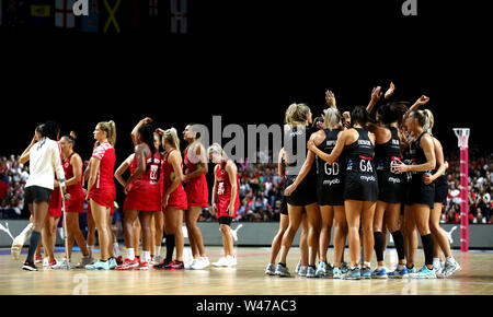 Both teams huddle after the final whistle during the Netball World Cup ...