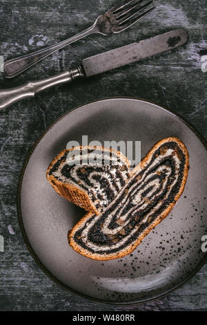 Homemade poppy seed cake for Christmas packed in paper Stock Photo - Alamy