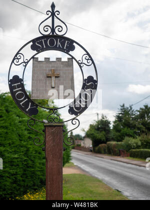 The village sign for Stoke Holy cross village Stock Photo - Alamy