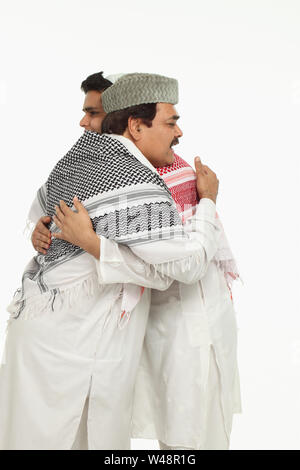 Middle-aged Indian Muslim man with Muslim goatee wearing a white ...