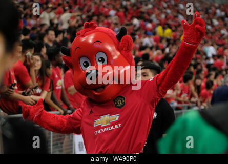 Manchester United mascot Fred the Red (right) greets Manchester United ...