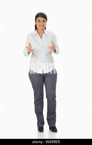 Full length portrait of a woman explaining something with hands ...