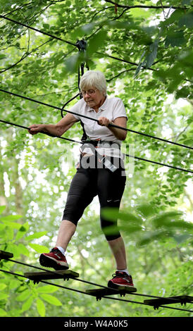 Eileen Noble, 84, navigates treetop crossing as she becomes the oldest ...