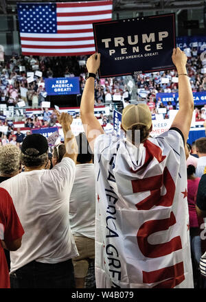 Supporters cheer as President Donald Trump walks onstage to speak at a ...
