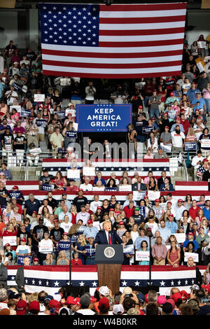 President Donald Trump addresses the crowd as he prepares to sign the ...