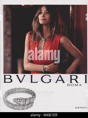poster advertising BVLGARI Roma fashion house with Carla Bruni in paper ...
