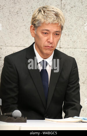 Japanese comedians Hiroyuki Miyasako and Ryo Tamura (unseen) attend a ...